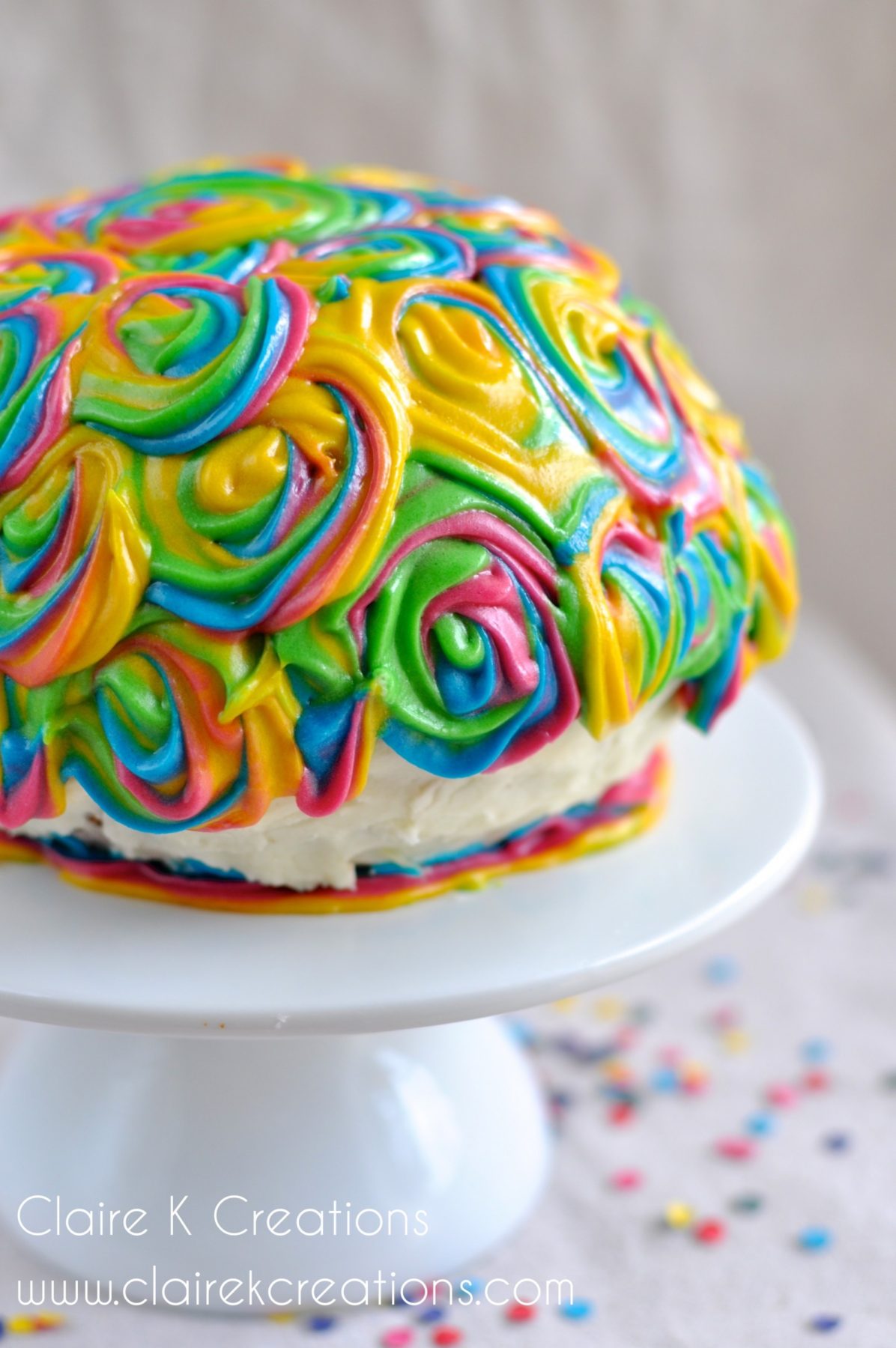 Rainbow icing Pinata Birthday cake: the original surprise-inside