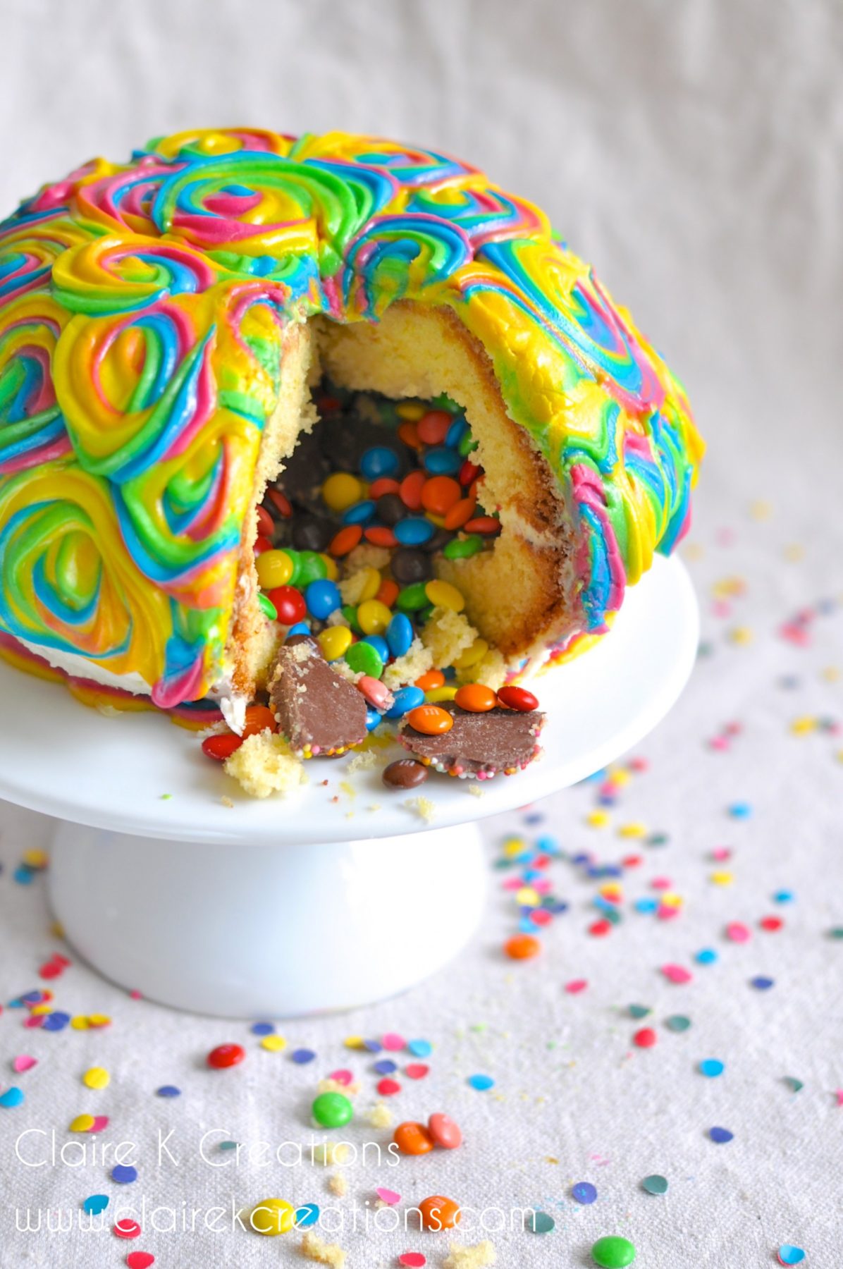 Rainbow icing Pinata Birthday cake: the original surprise-inside