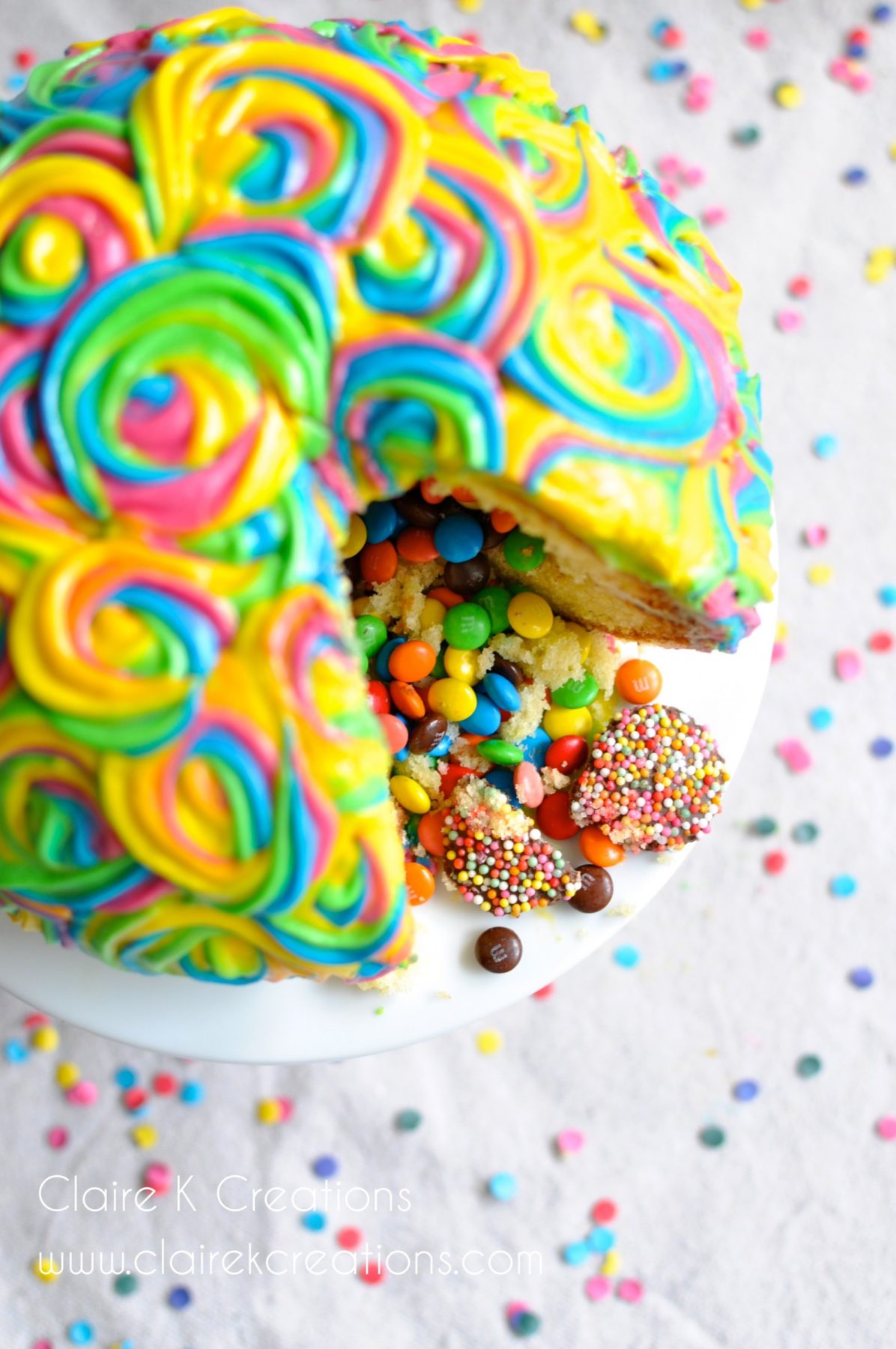 Rainbow icing Pinata Birthday cake: the original surprise-inside